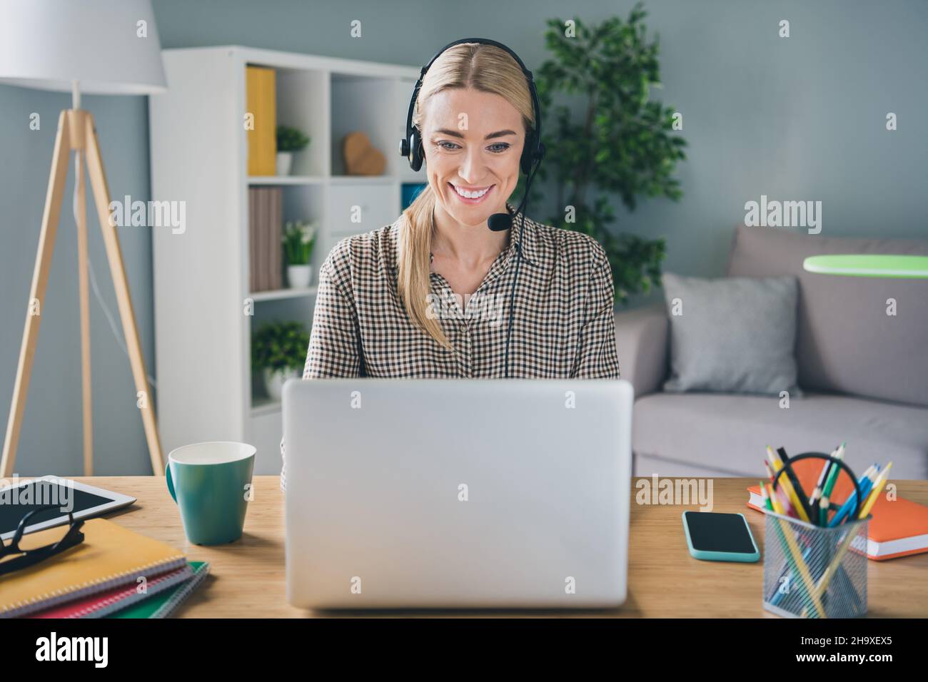 Photo of professional secretary receptionist lady sit desk get clients ...