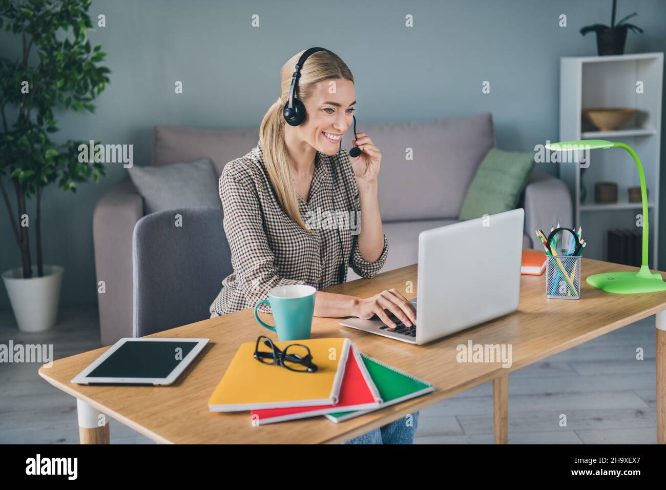 Photo of professional marketer ceo lady sit desk reception help boss ...