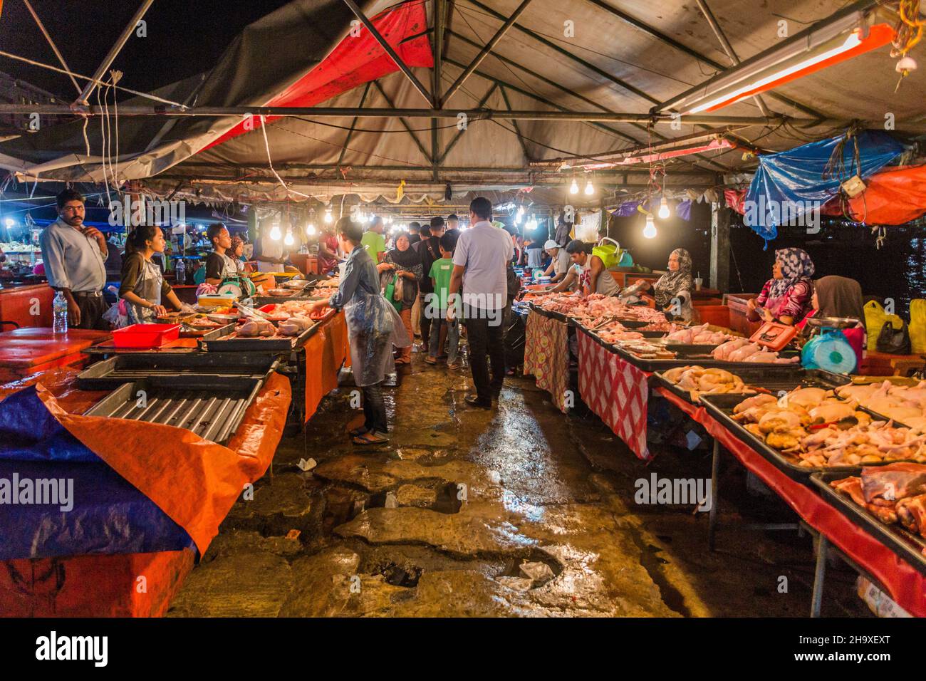 KOTA KINABALU, MALAYSIA - FEBRUARY 25, 2018: Chicken stalls at the ...