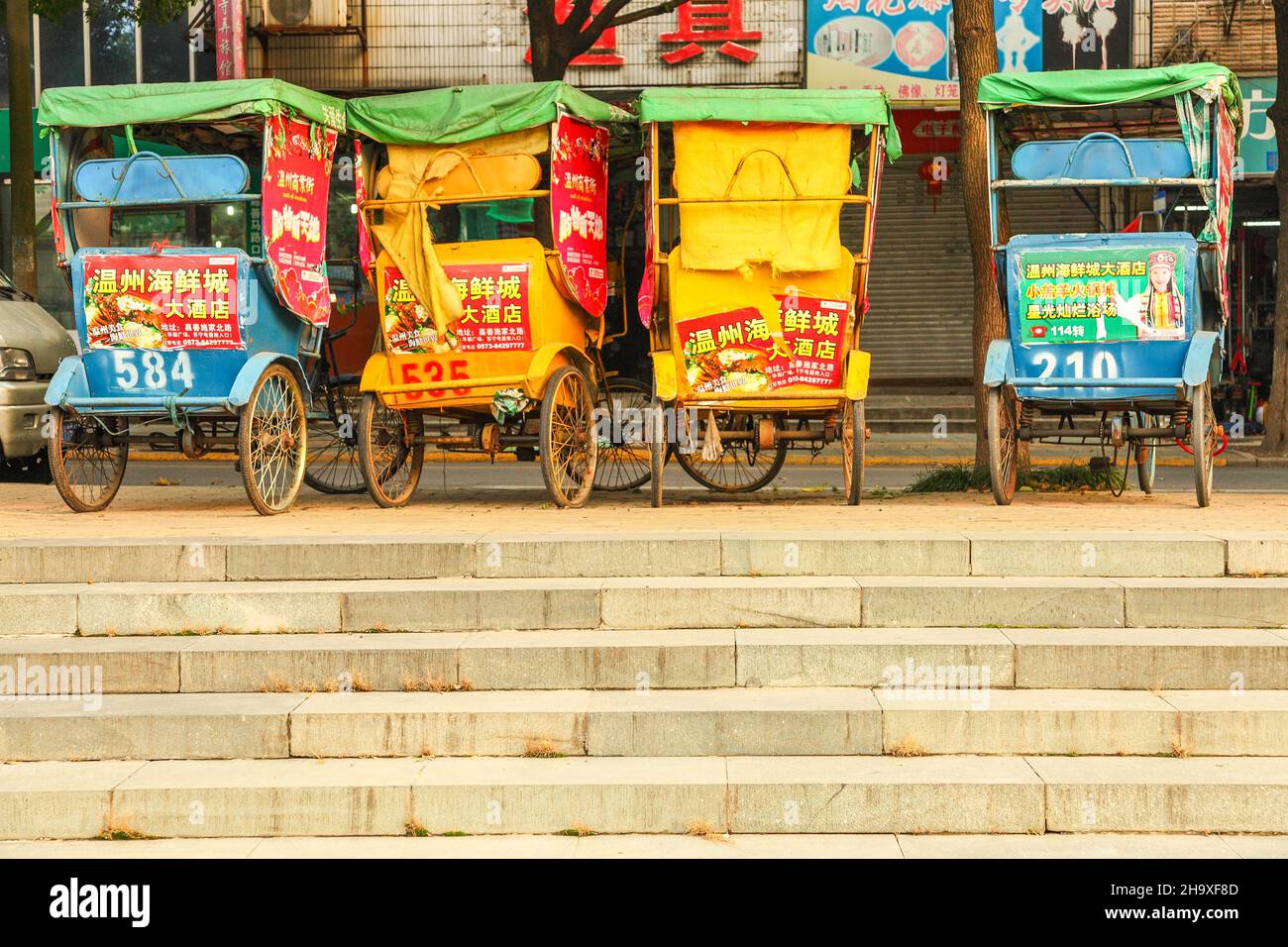 Chinese rickshaws hi-res stock photography and images - Alamy