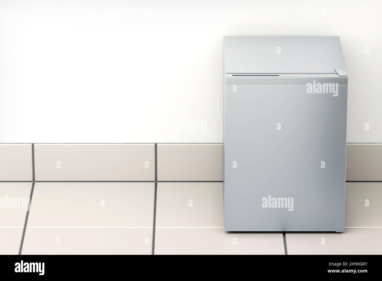 Silver small refrigerator in the kitchen Stock Photo - Alamy