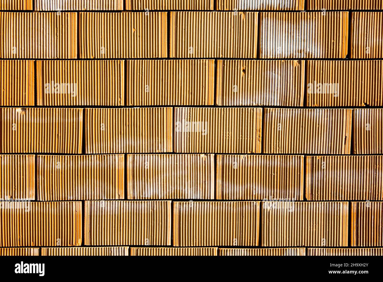 Brick wall background. Ornge brick layer texture Stock Photo - Alamy