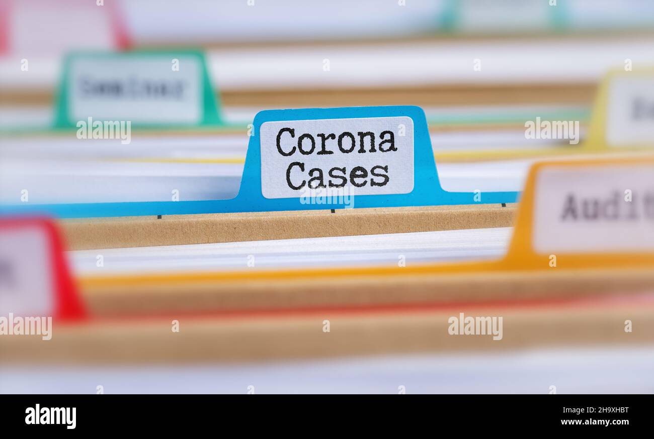 File folders with a tab labeled Corona Cases Stock Photo - Alamy