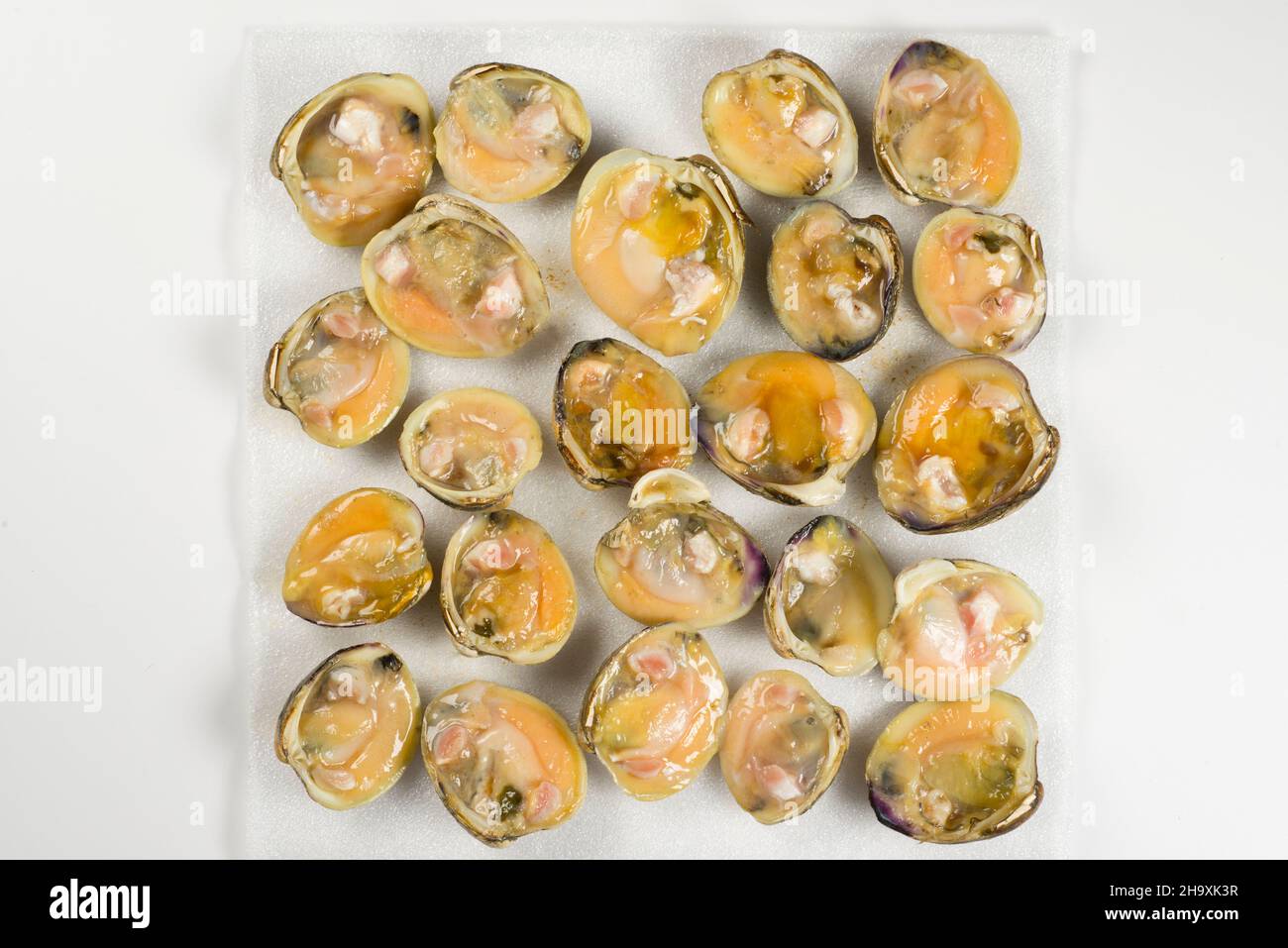 Fresh clams, halved Stock Photo - Alamy