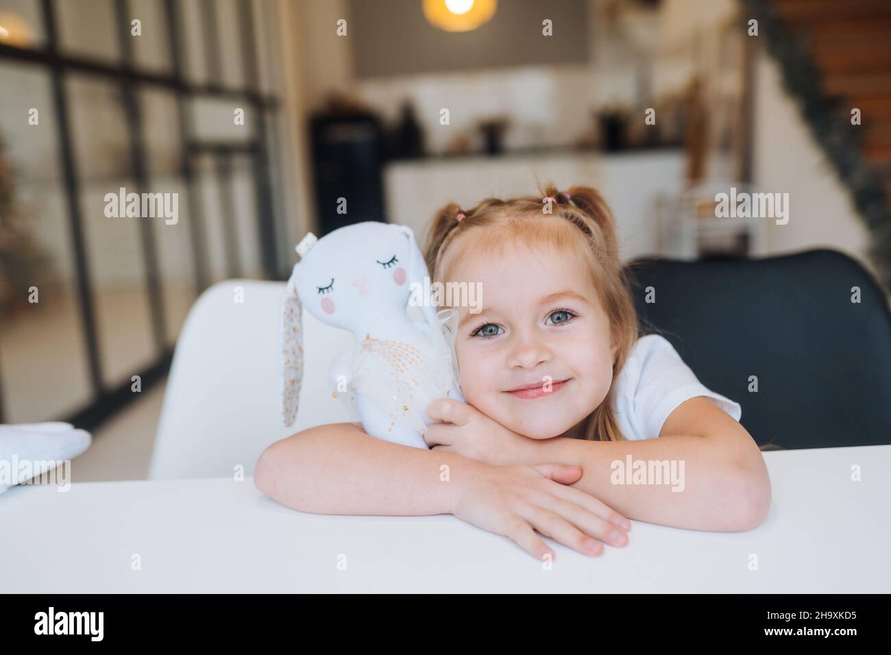 Baby hugging favorite toy hi-res stock photography and images - Alamy