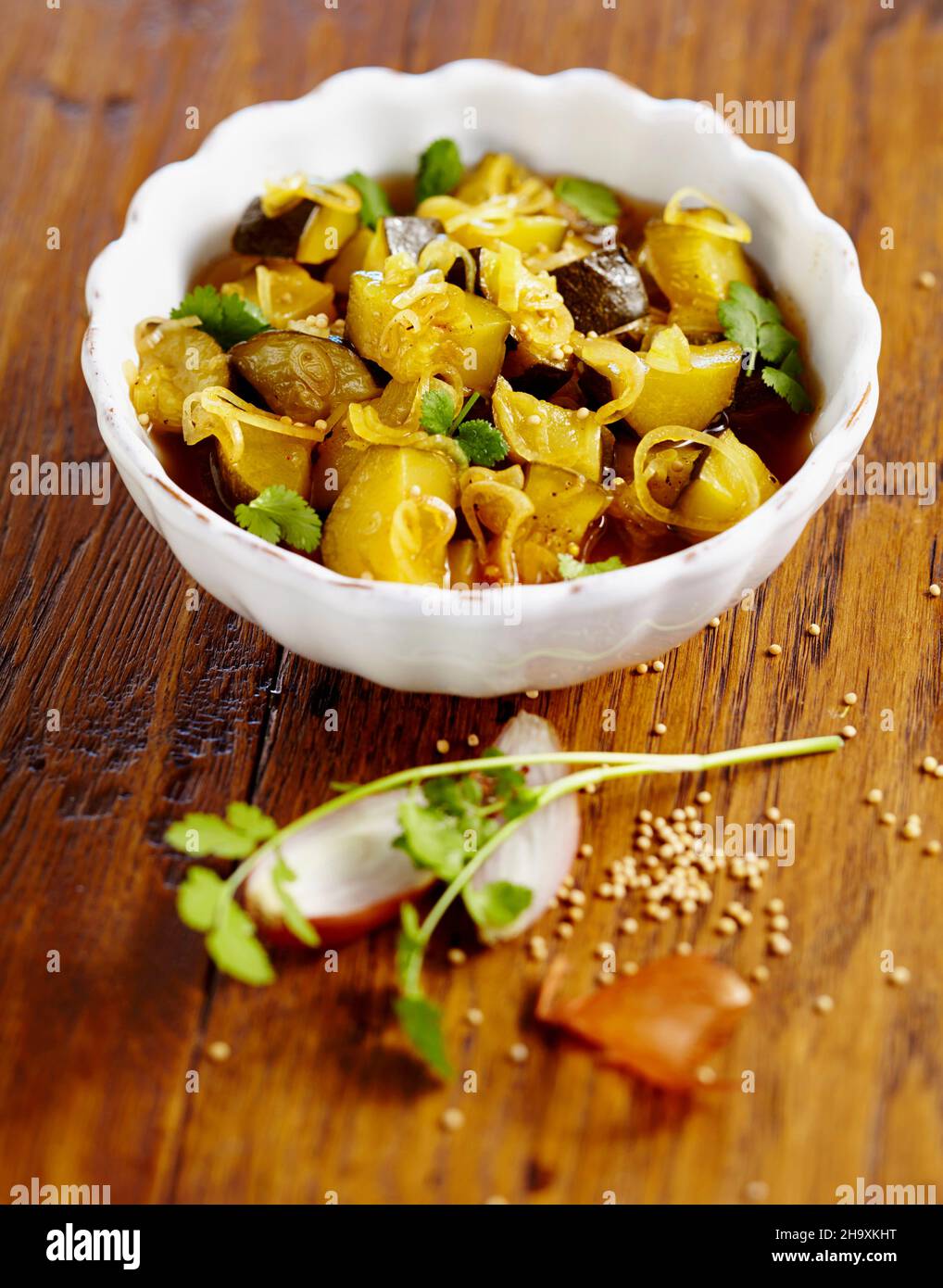 Pickled, curried courgette Stock Photo - Alamy