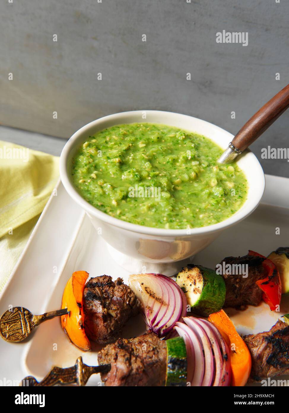 Green tomato and avocado salsa, skewer Stock Photo - Alamy