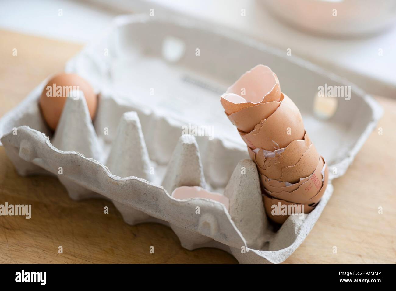 A stack of eggshells in an egg carton Stock Photo - Alamy