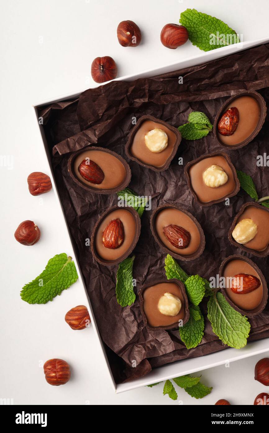 Concept of sweets with chocolate candies on white background Stock ...