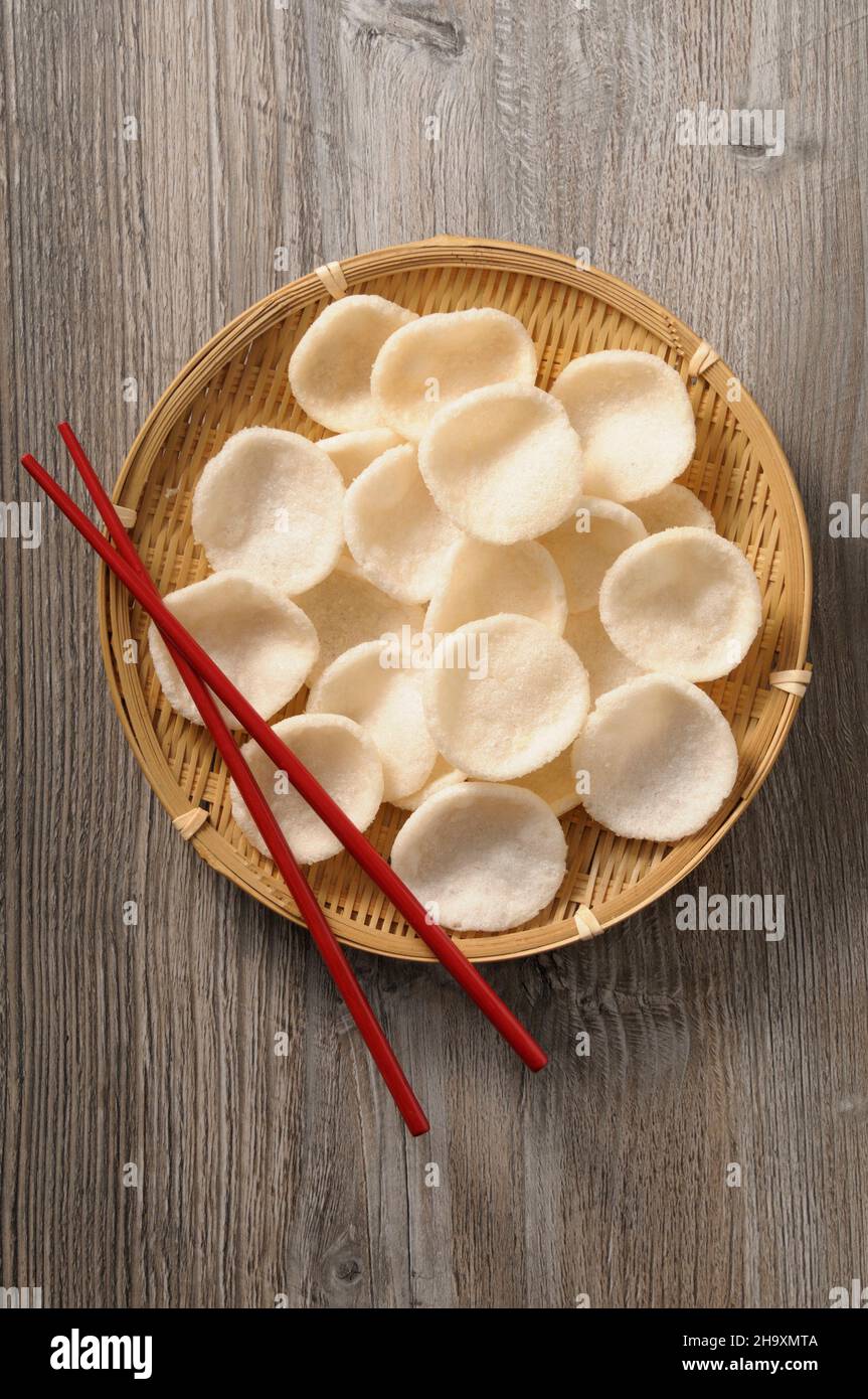 Prawn crackers in a bamboo basket Stock Photo - Alamy