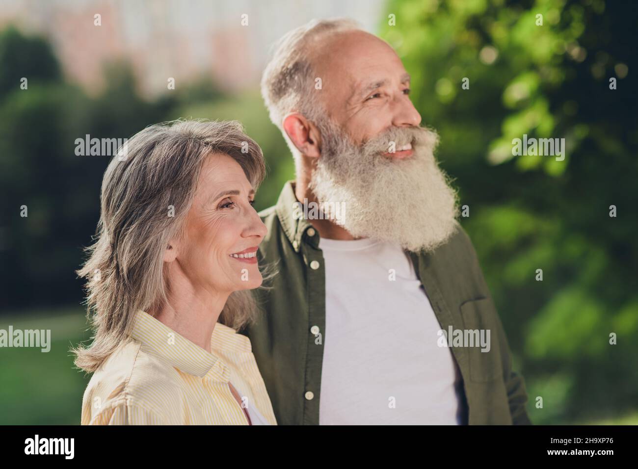 Photo of two retired people grandparents couple look away wear casual ...