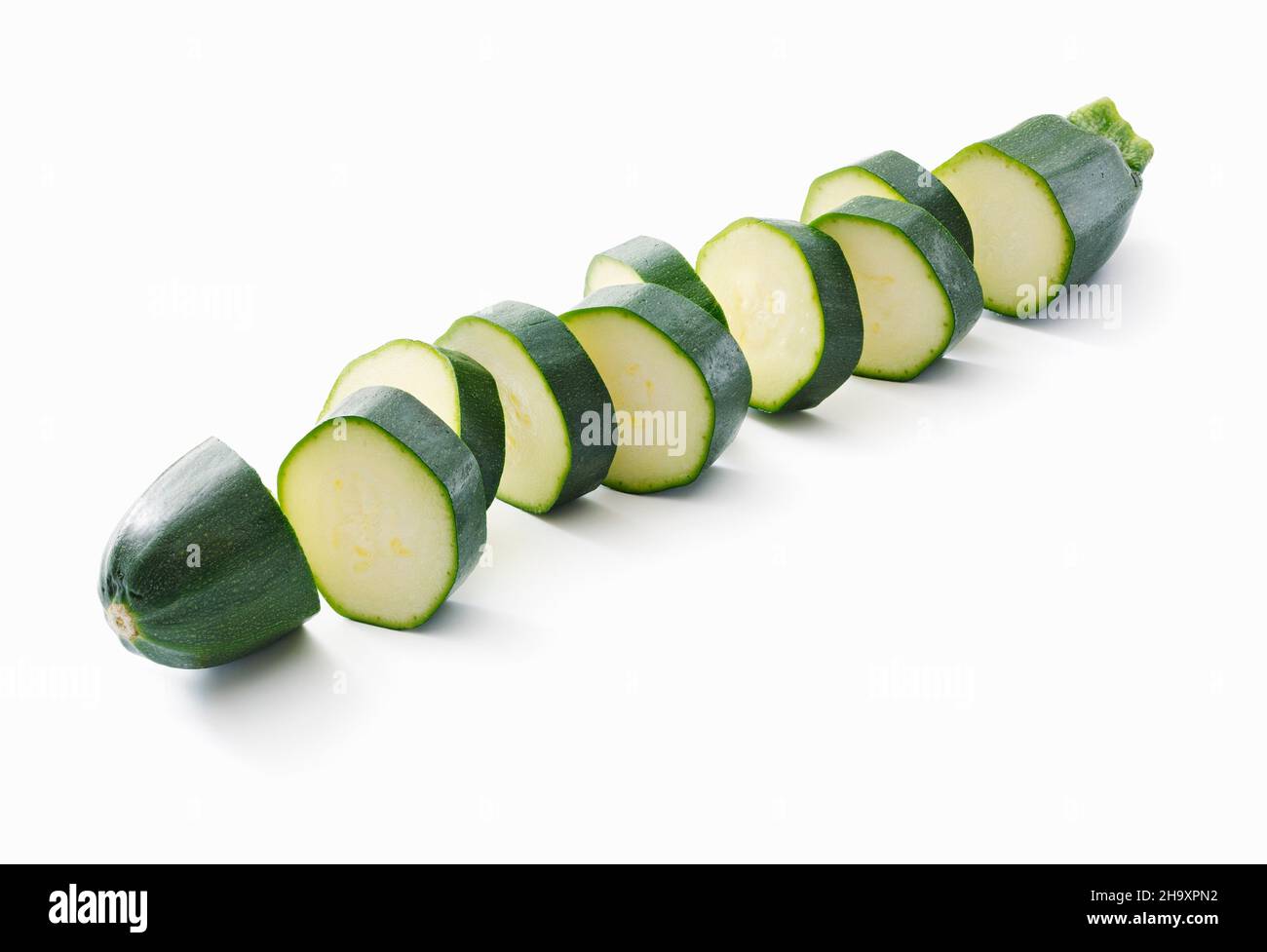 A sliced courgette Stock Photo - Alamy
