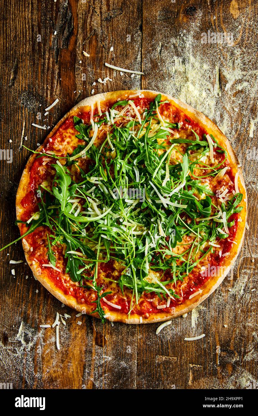 Pizza with rocket Stock Photo - Alamy