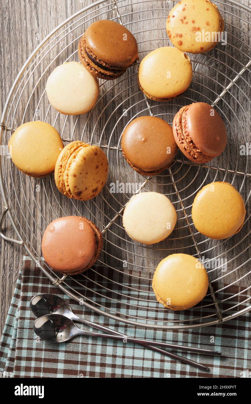 Macaroons in different shades of brown Stock Photo - Alamy