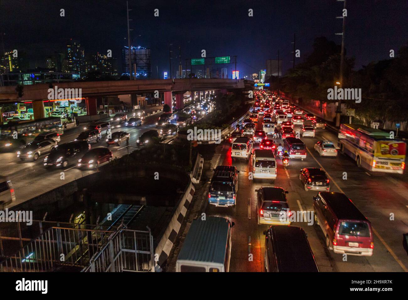 MANILA, PHILIPPINES - JANUARY 29, 2018: Night highway traffic in Manila ...