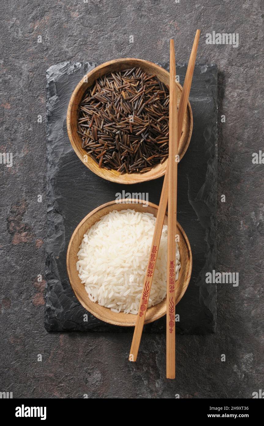 White and black rice in small bowls (top view Stock Photo - Alamy