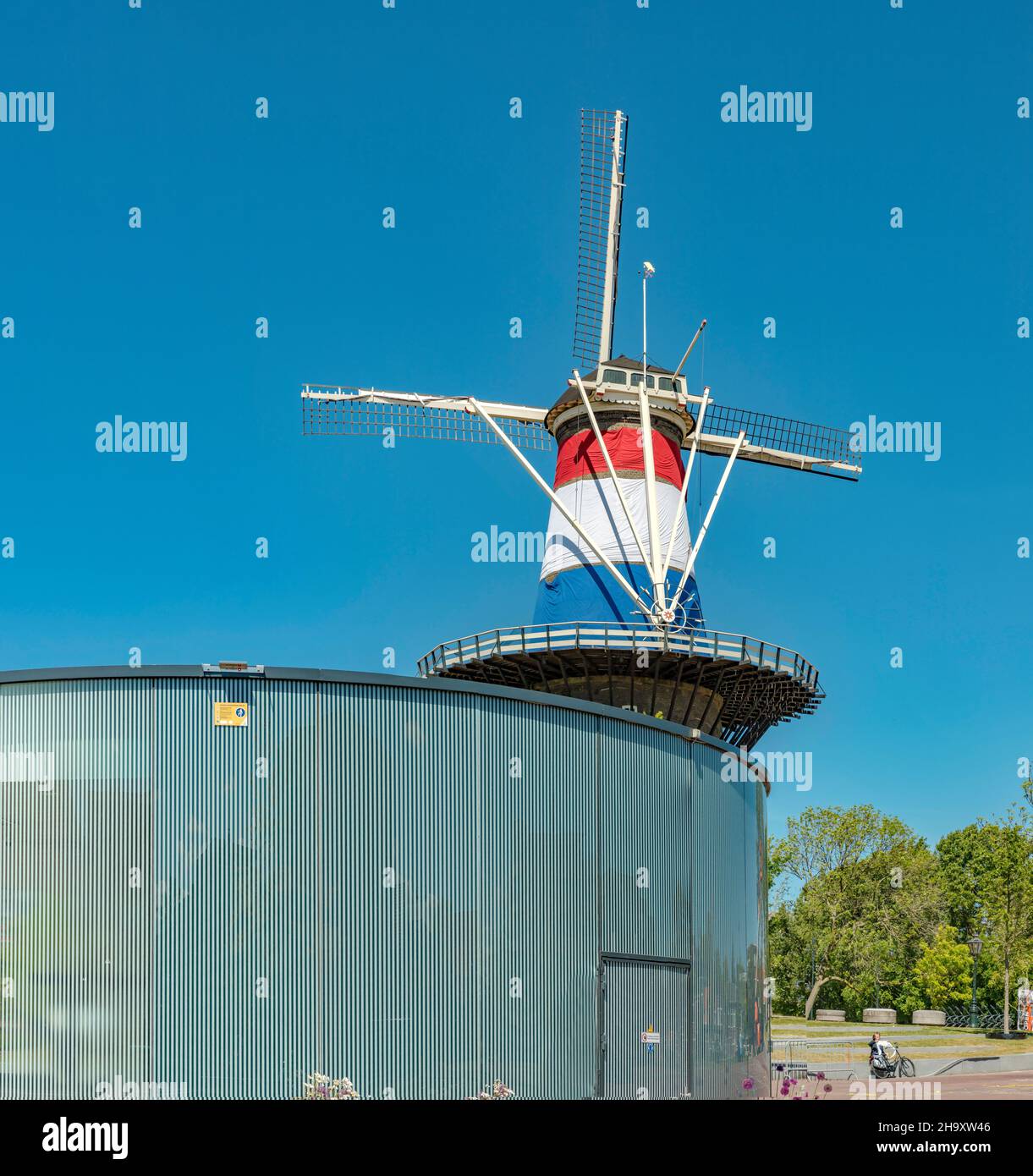 Windmill De Valk and a parking garage entrance Stock Photo - Alamy