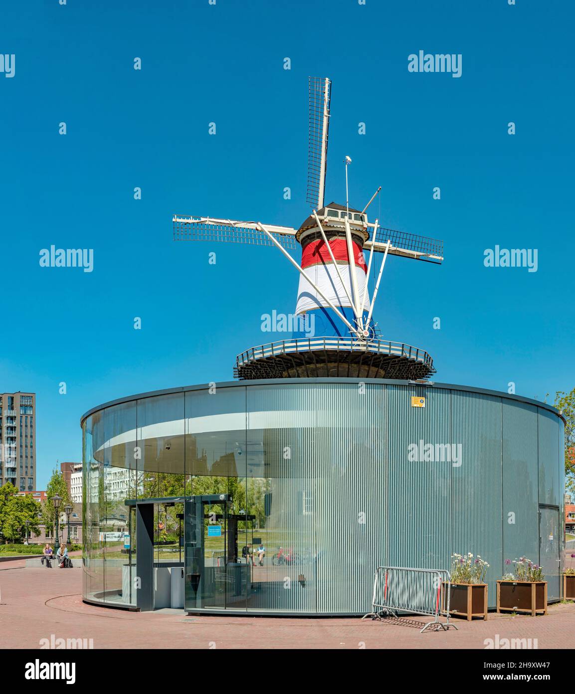 Windmill De Valk and a parking garage entrance Stock Photo - Alamy