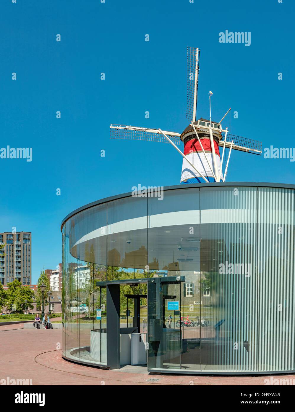 Windmill De Valk and a parking garage entrance Stock Photo - Alamy