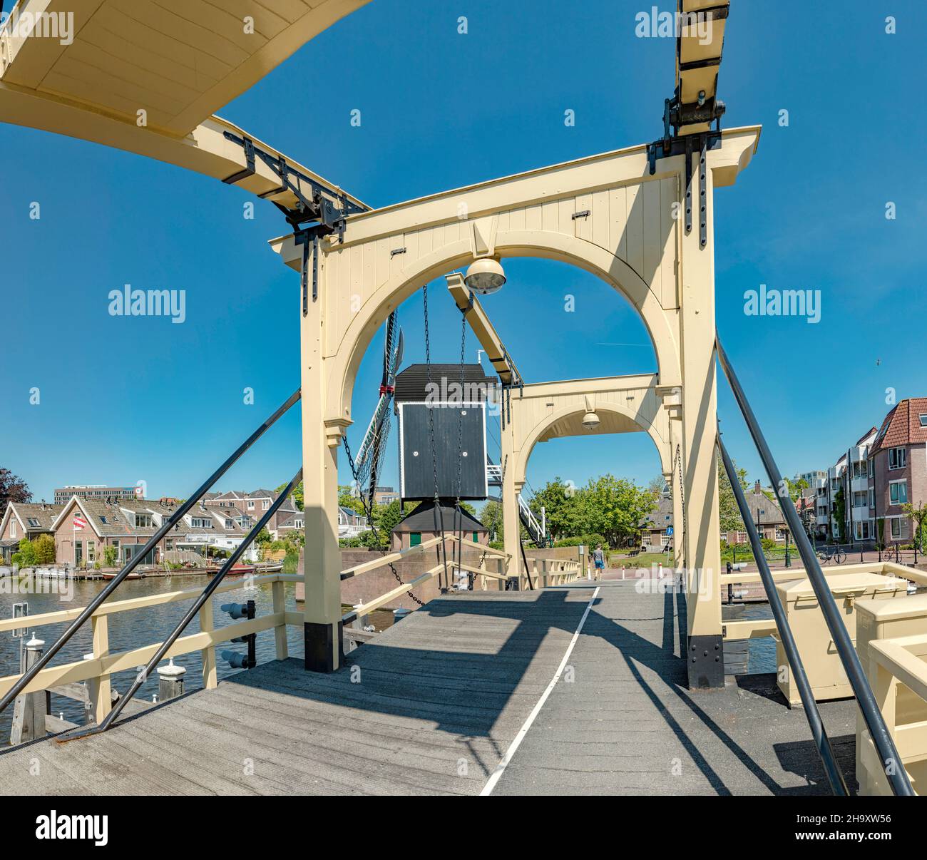 Double drawbridge towards the windmill called De Put Stock Photo - Alamy