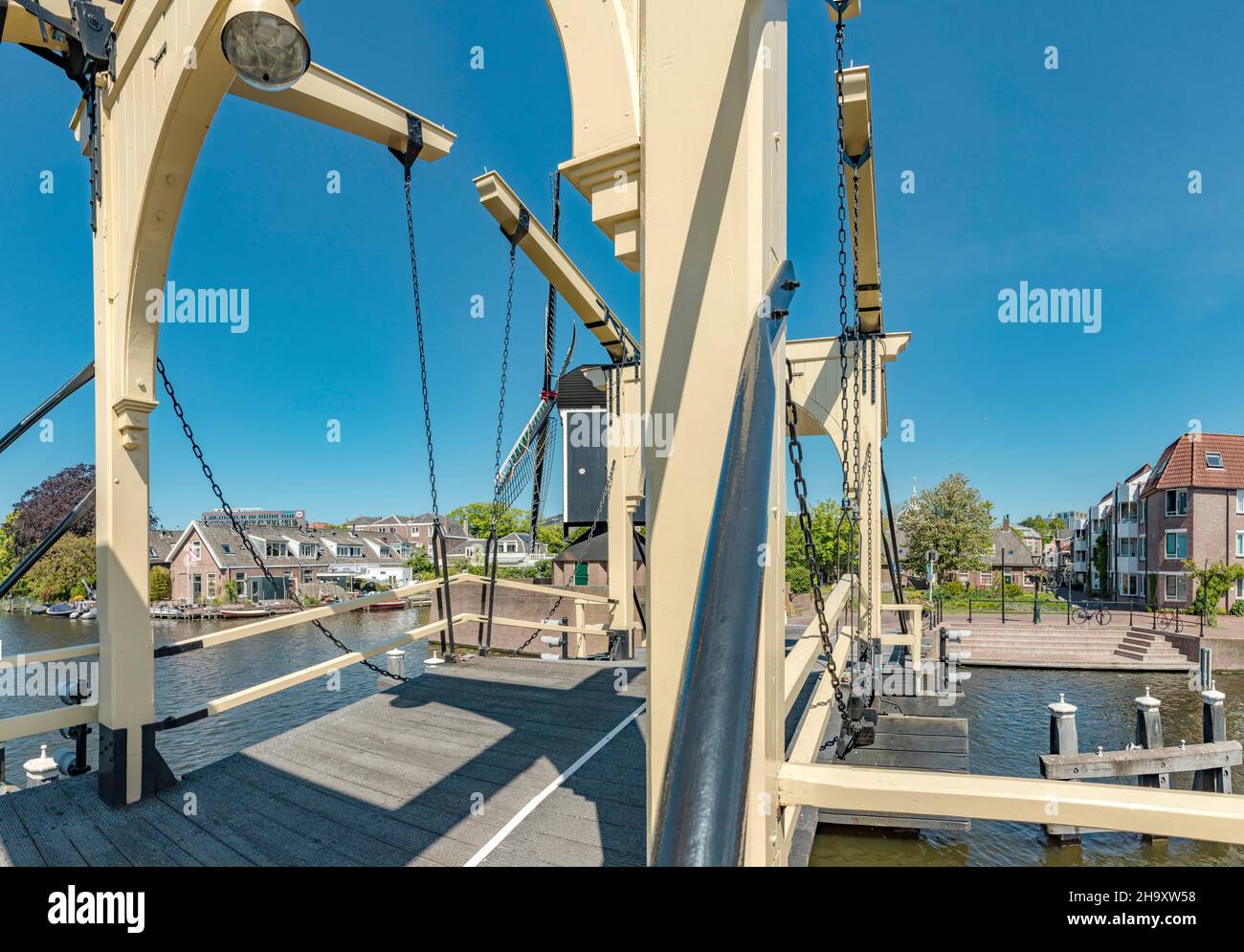 Double drawbridge towards the windmill called De Put Stock Photo - Alamy