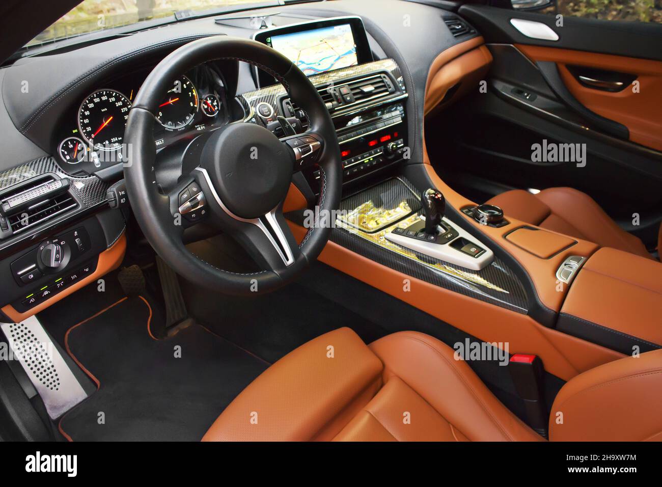 View of the interior of a modern automobile showing the dashboard. Car ...