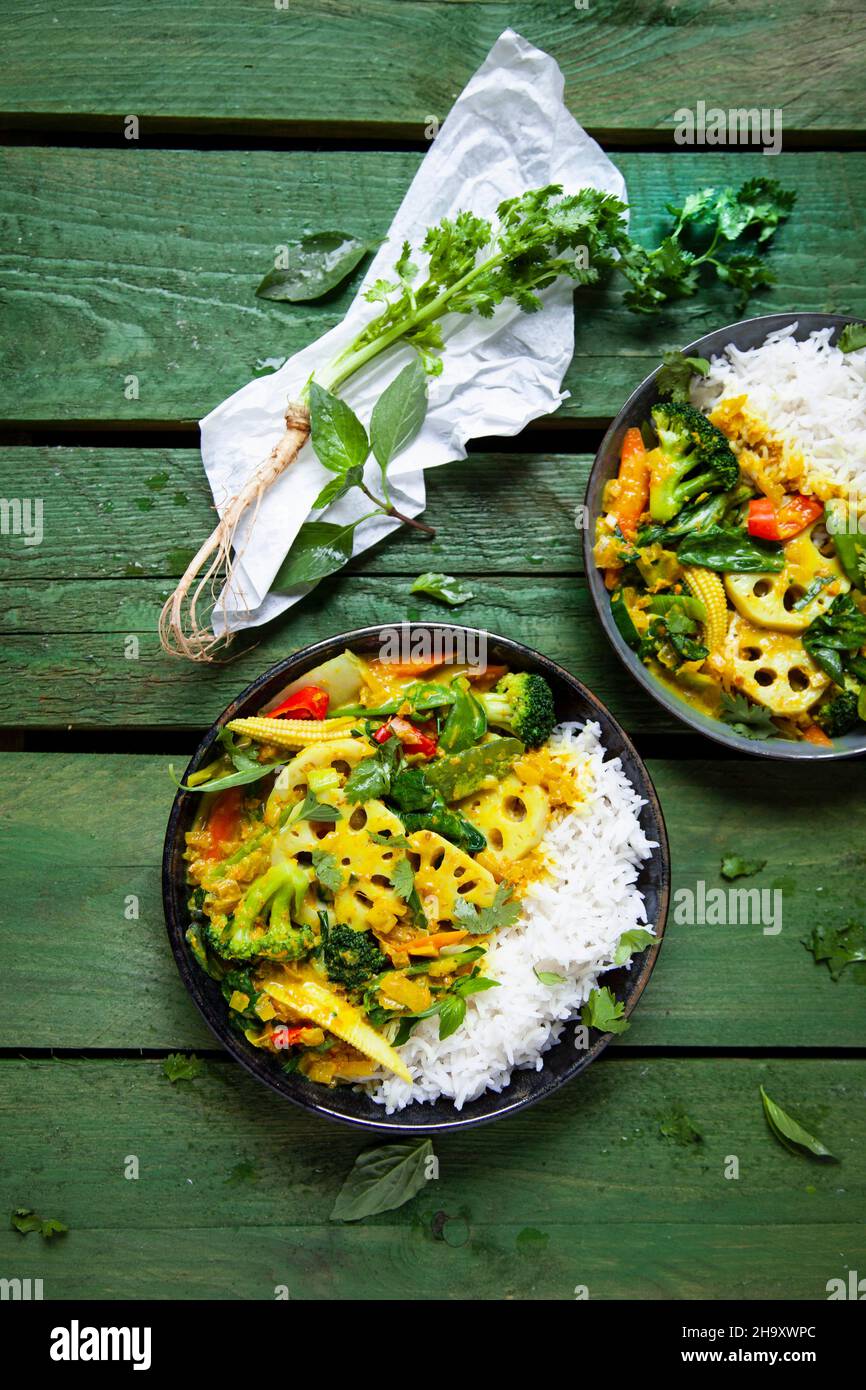 Yellow vegetable curry with lotus roots and Basmati rice Stock Photo ...