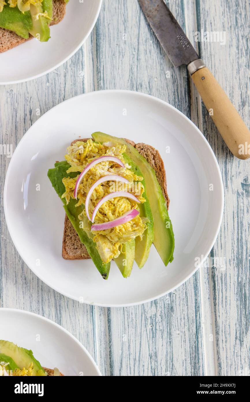 Toast with chicken and avocado Stock Photo - Alamy