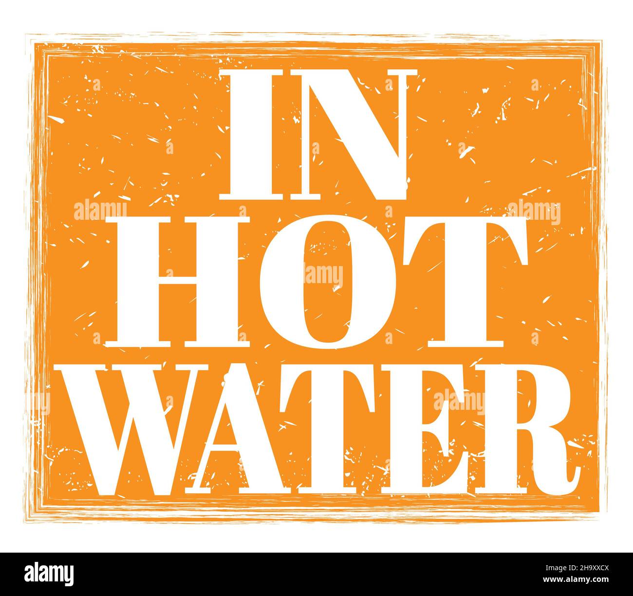 IN HOT WATER, written on orange grungy stamp sign Stock Photo - Alamy