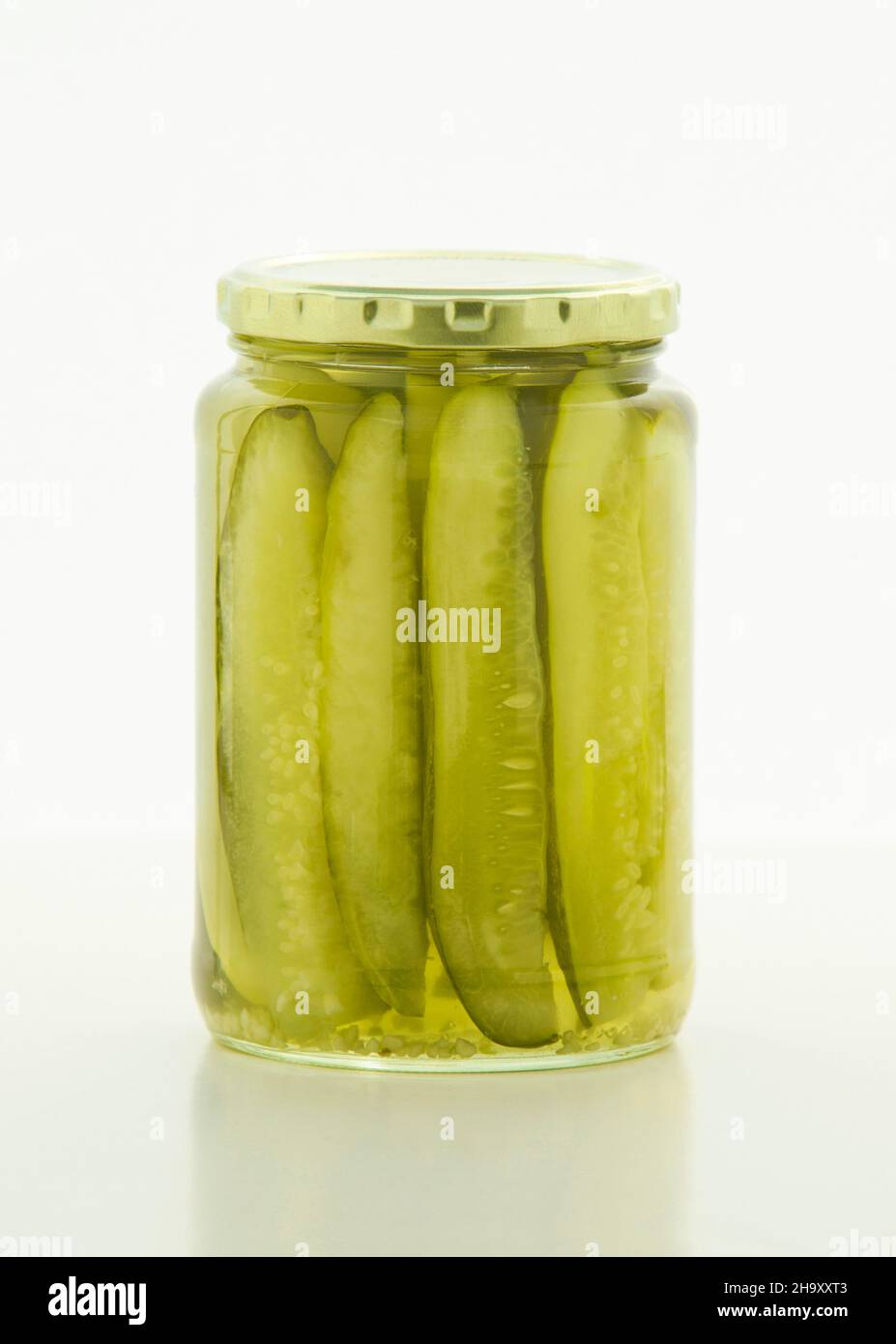 Dill Pickles in jar Stock Photo - Alamy