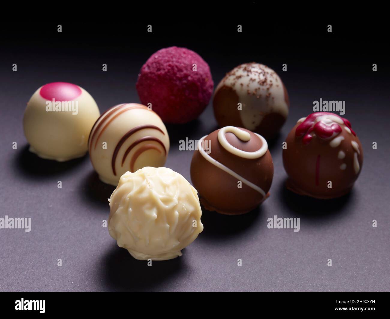 Heart Shaped White Chocolate Candy with Milk Chocolates Stock Photo - Alamy