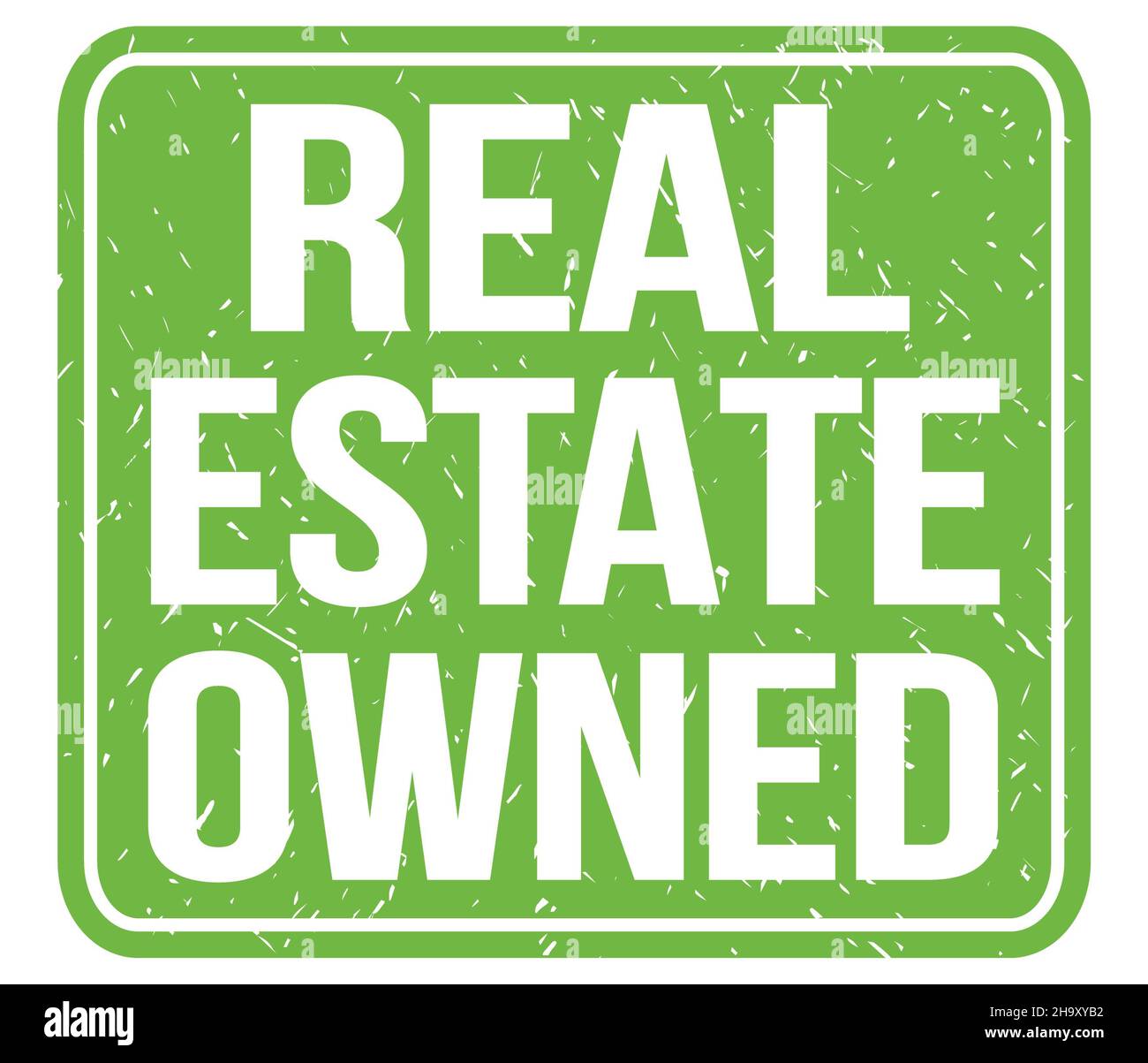 REAL ESTATE OWNED, text written on green vintage stamp sign Stock Photo ...