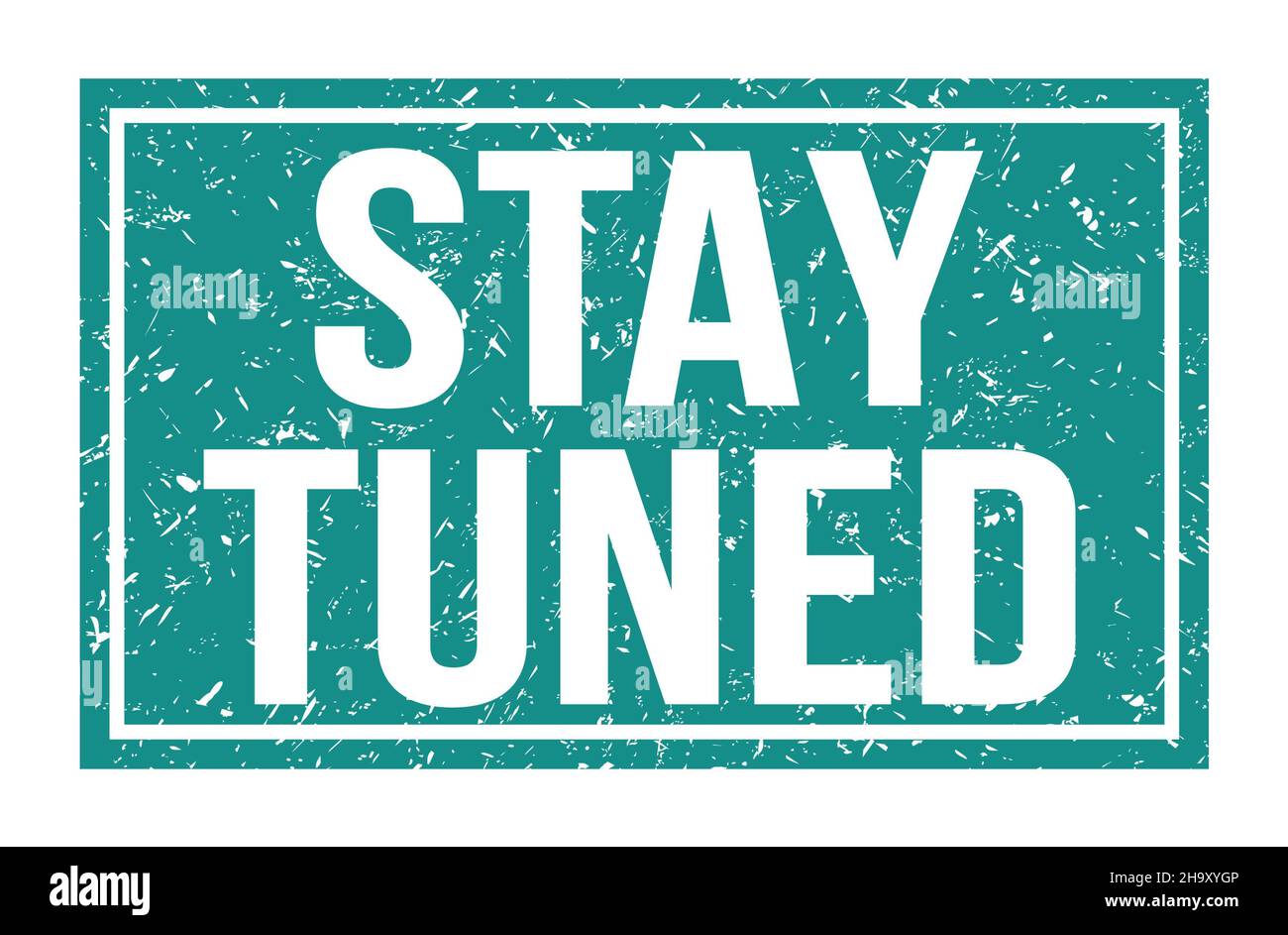 STAY TUNED, words written on blue rectangle stamp sign Stock Photo - Alamy