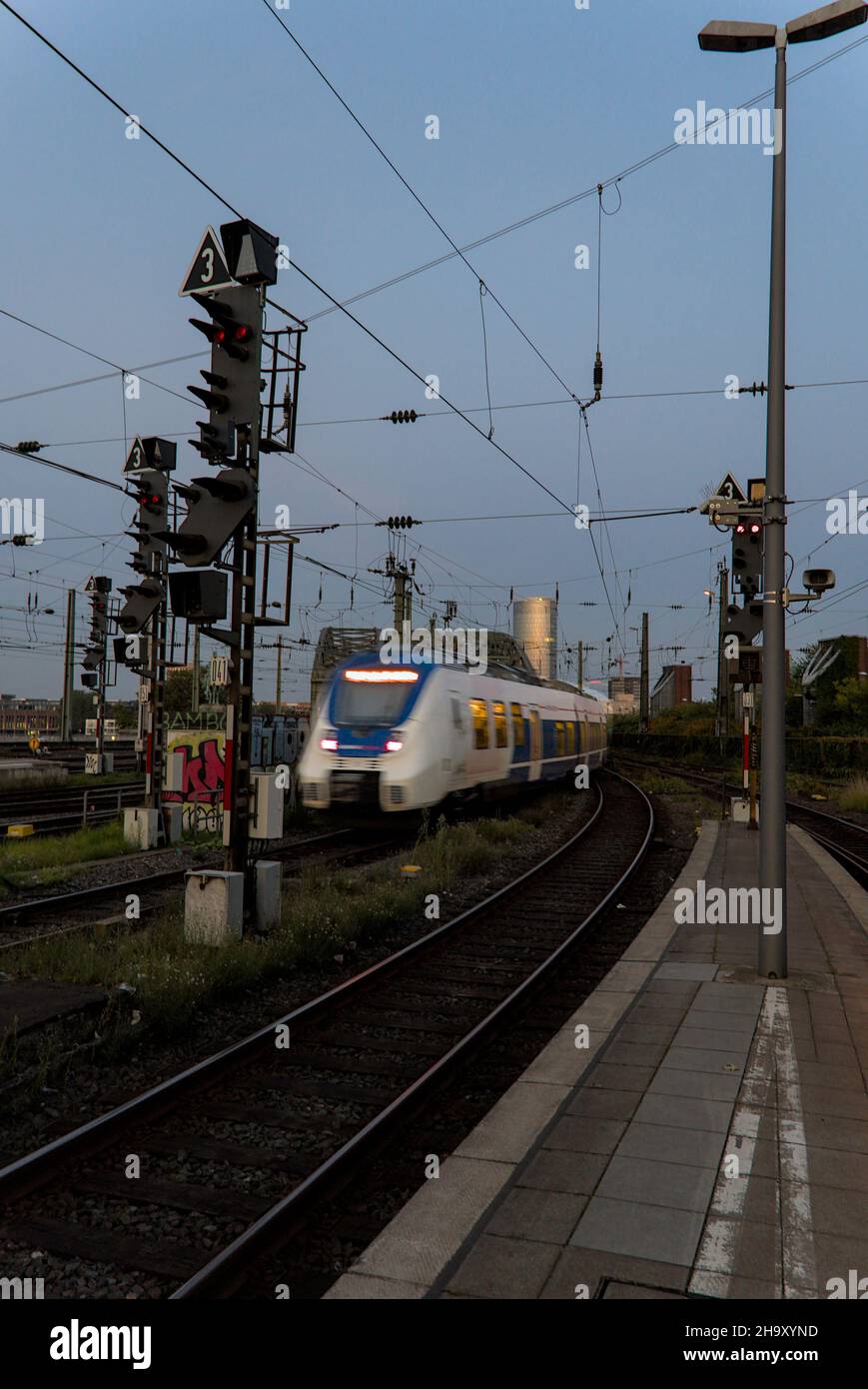 Vertical shot of the passenger train arriving at the central train ...