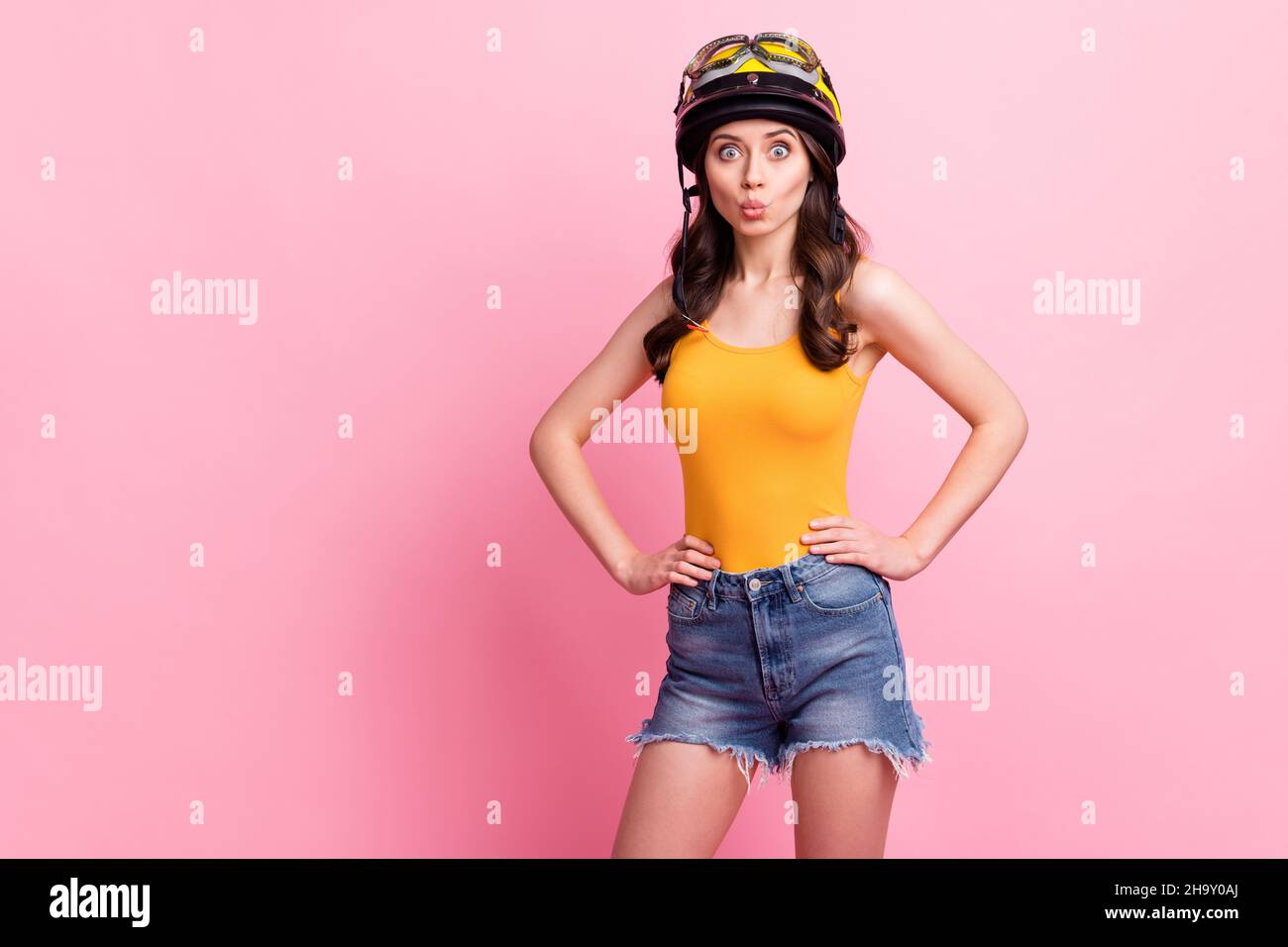 Photo Of Flirty Sporty Teen Curly Hairdo Lady Blow Kiss Wear Orange Top