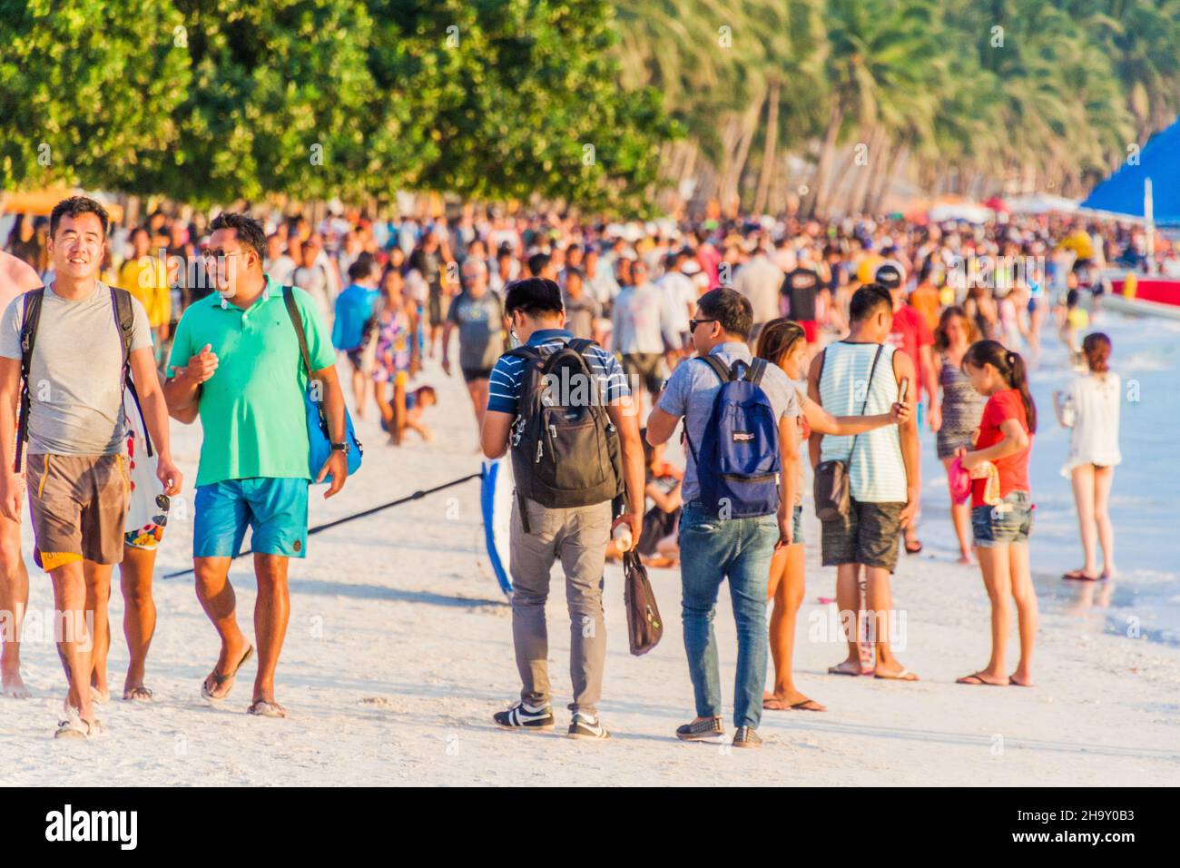 BORACAY, PHILIPPINES - FEBRUARY 1, 2018: Crowds of people at the White ...