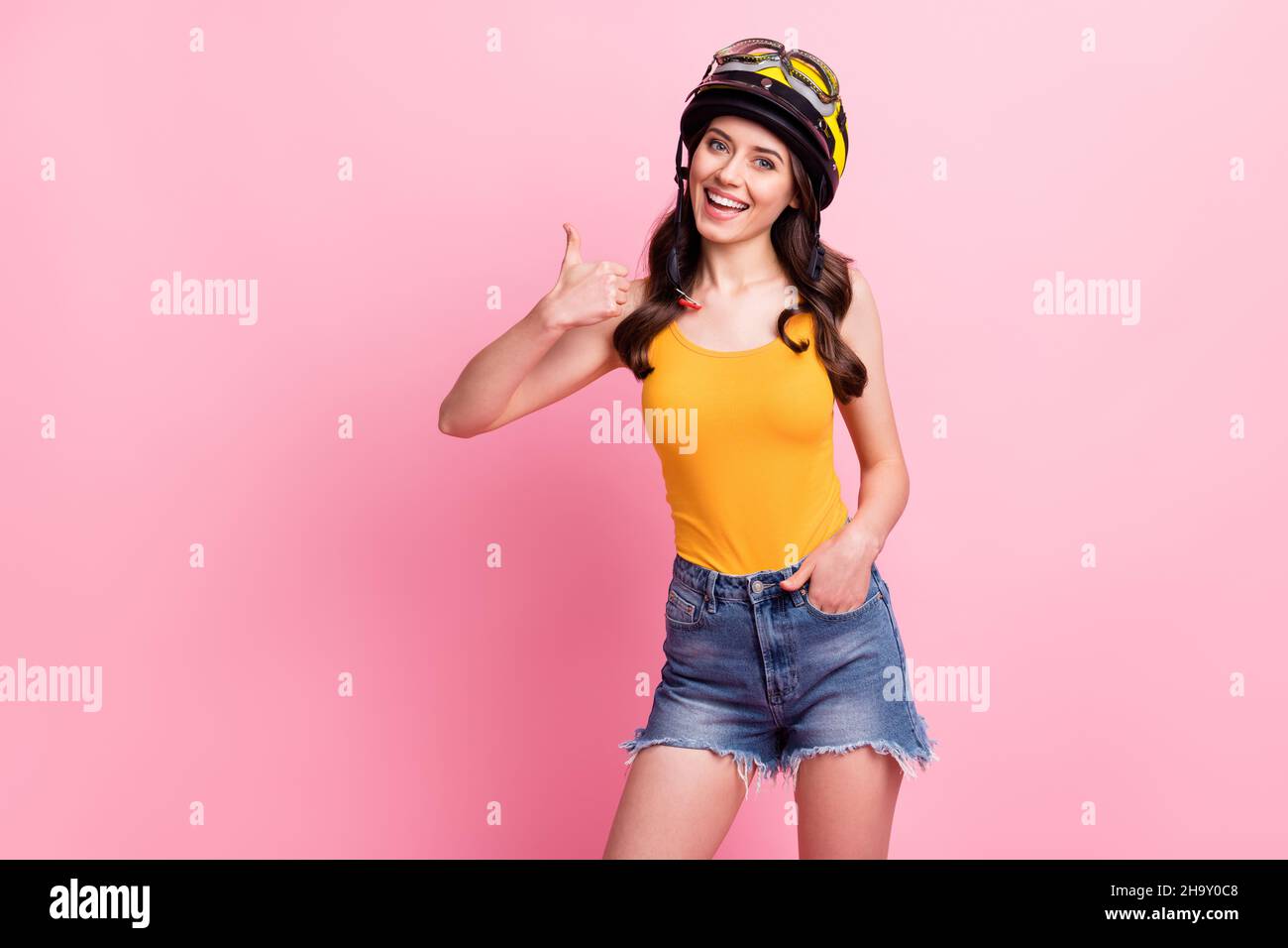Photo Of Cool Teen Curly Hairdo Lady Show Thumb Up Wear Orange Top
