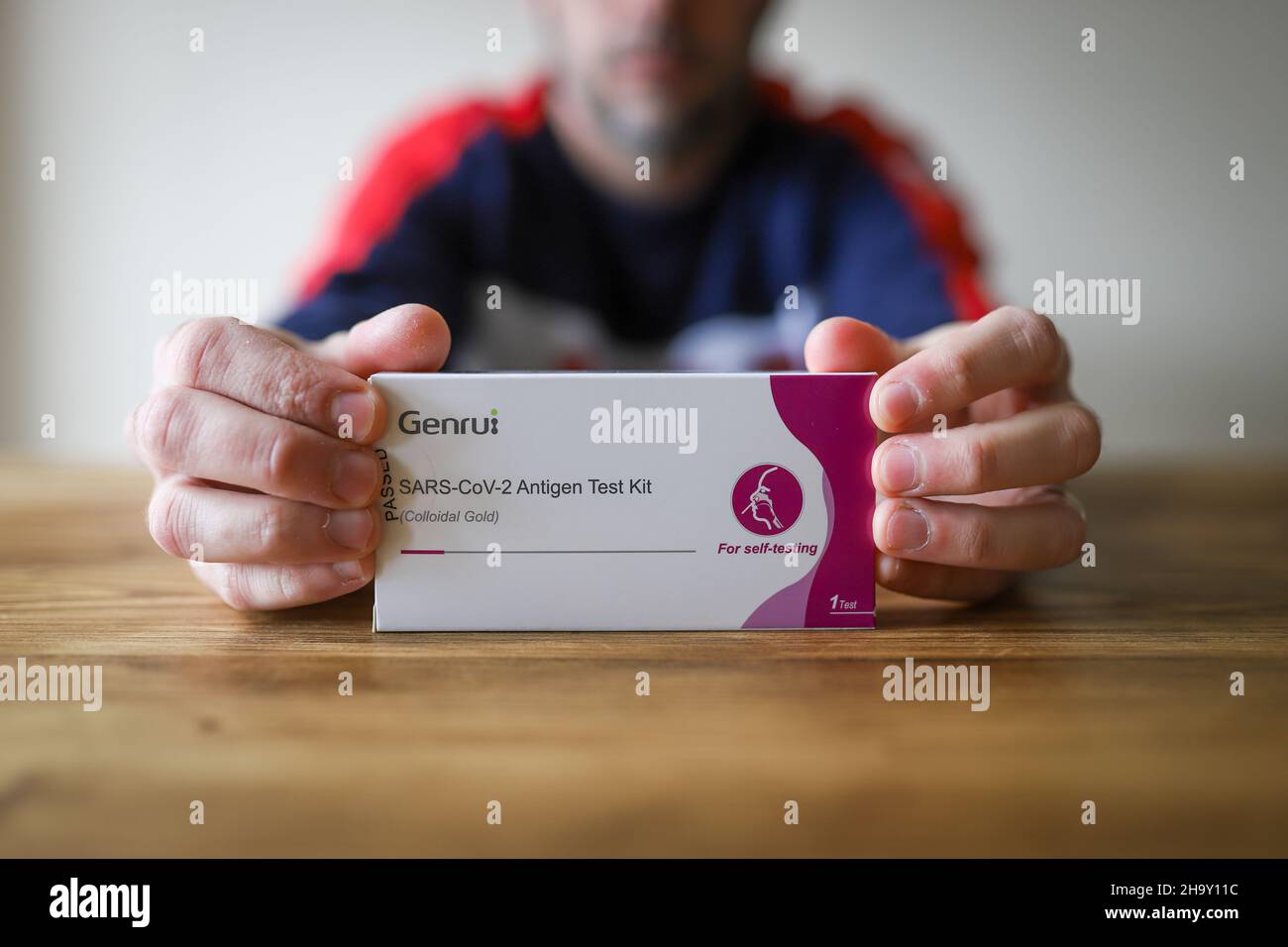 December 9th, 2021, Cork, Ireland - Someone holds a SARS 2 CoV 2 ...