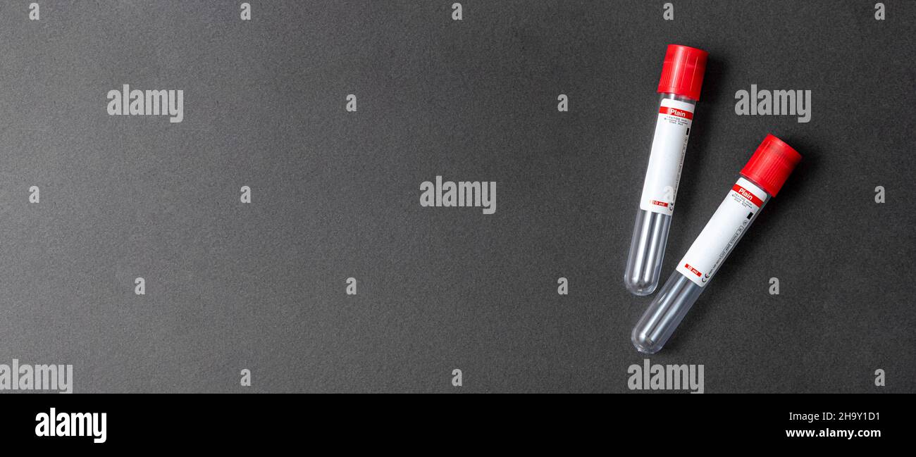 Two blood test tubes on black background with blank text area Stock ...