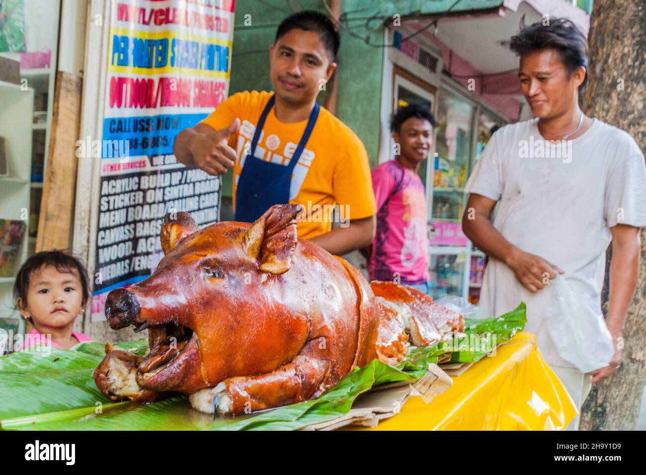 BORACAY, PHILIPPINES - FEBRUARY 3, 2018: Lechon roasted piglet stall on ...