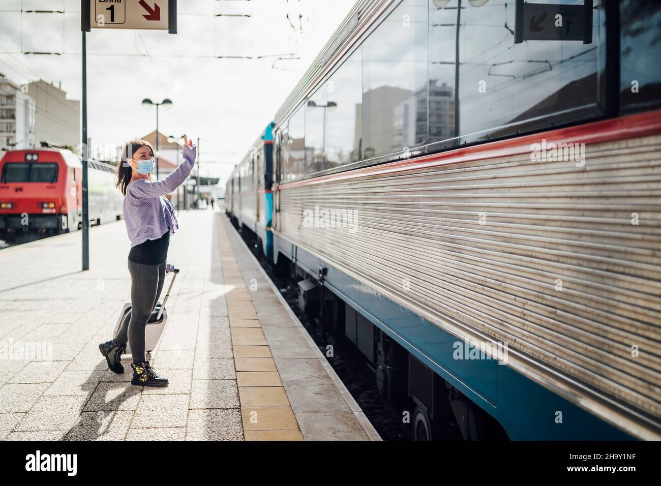 Waving goodbye train hi-res stock photography and images - Alamy