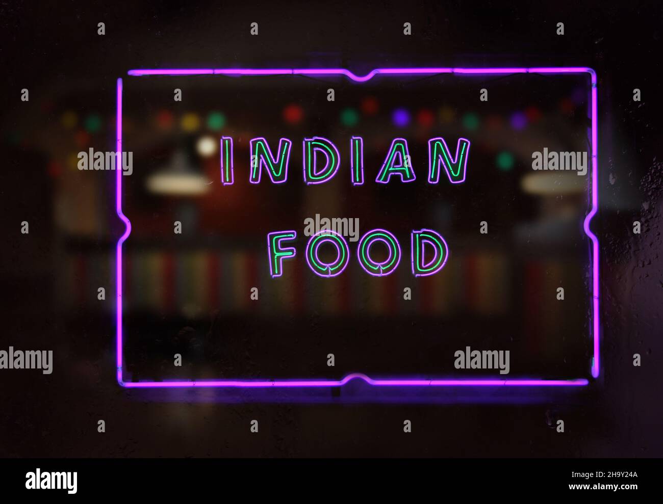 Vintage Neon Indian Food Sign in Rainy Window Stock Photo - Alamy