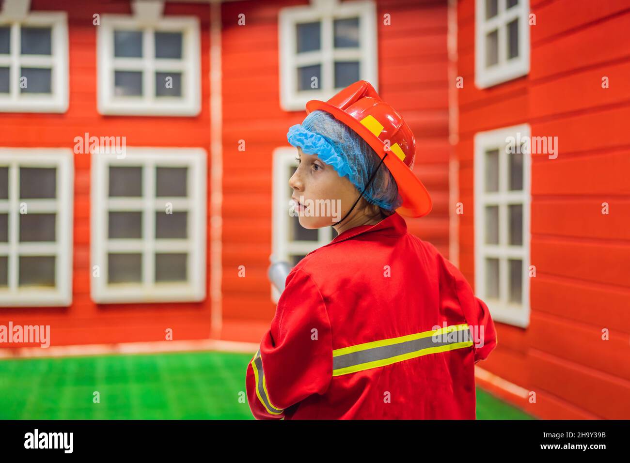 Child firefighter costume hi-res stock photography and images - Alamy