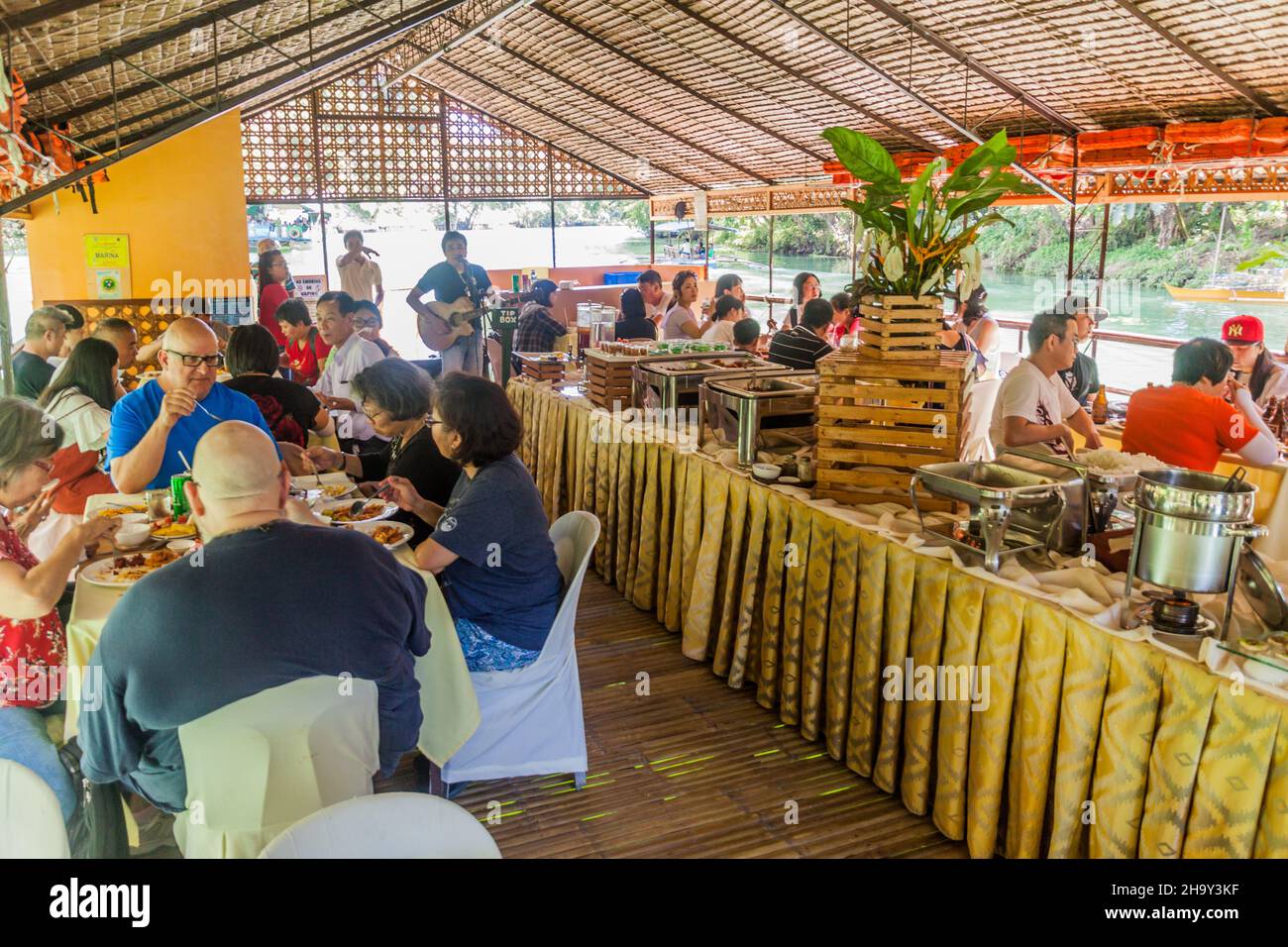 LOBOC, PHILIPPINES - FEB 10, 2018: Floating restaurant at Loboc river ...
