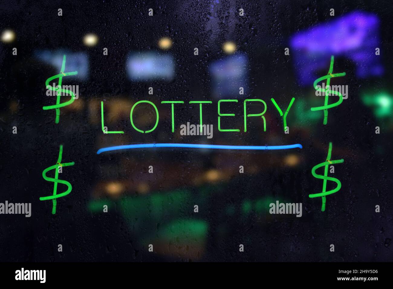 Neon Lottery Sign in Rainy Window Stock Photo - Alamy