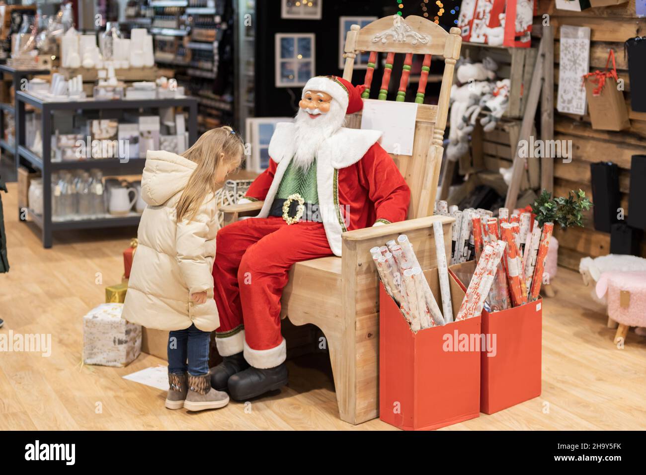 Children visiting santa in christmas hi-res stock photography and ...