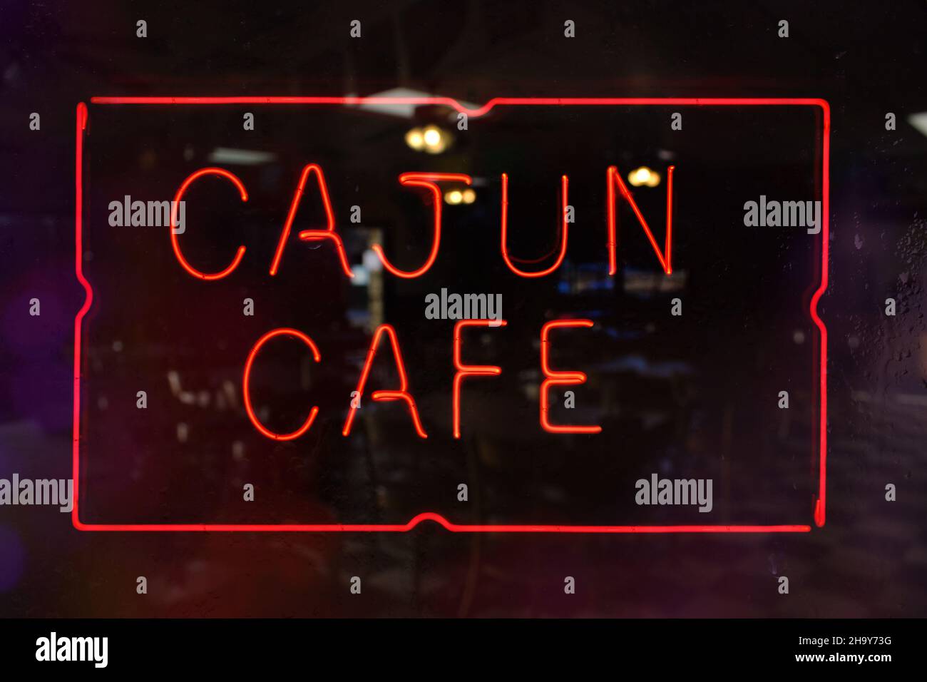 Vintage Cajun Cafe Neon Sign A Style of American Food Stock Photo - Alamy