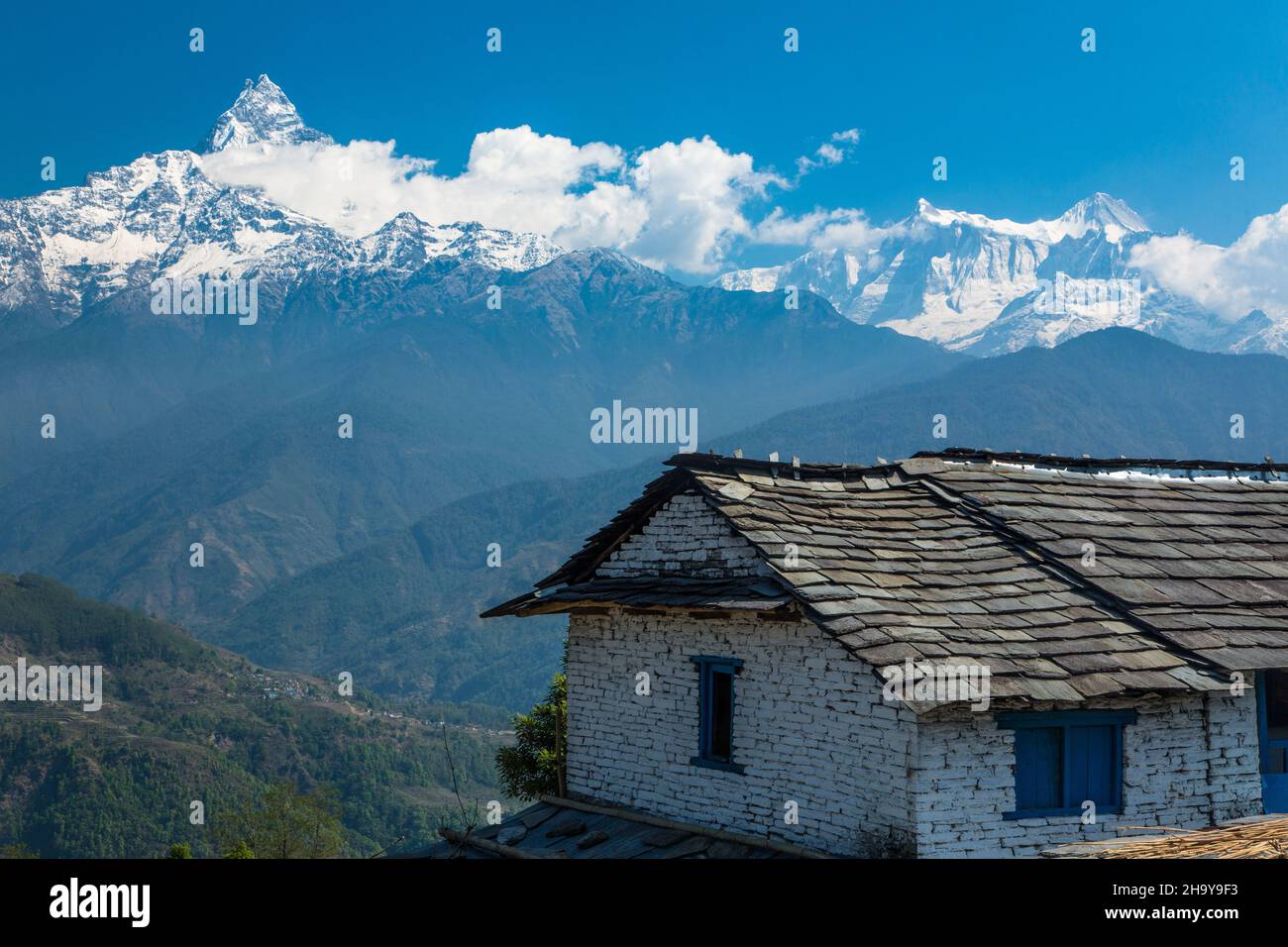 A traditional Nepalese farm house in the Himalayan foothill village of ...