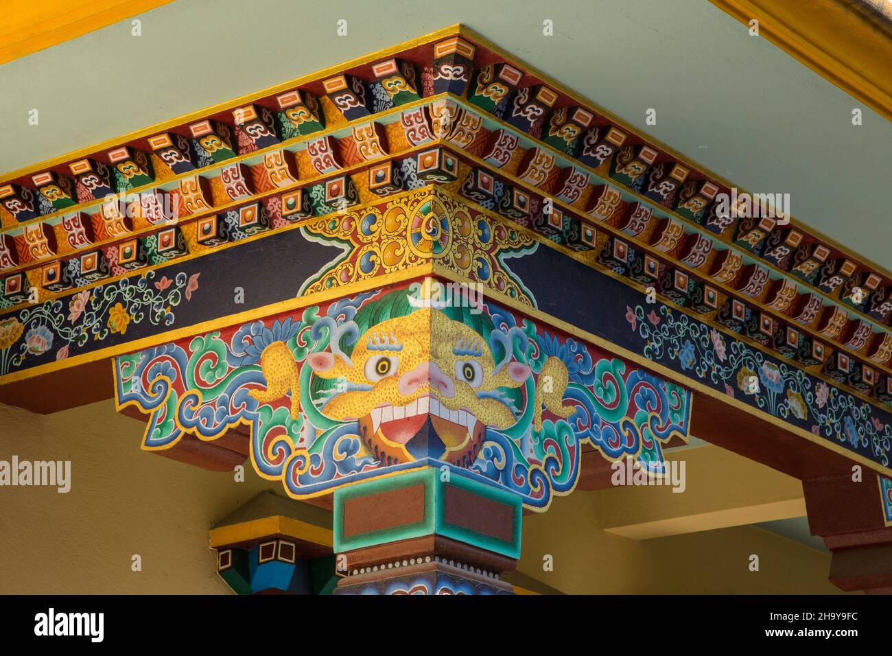 Colorful paintings of Buddhist religious art under the eaves of the ...