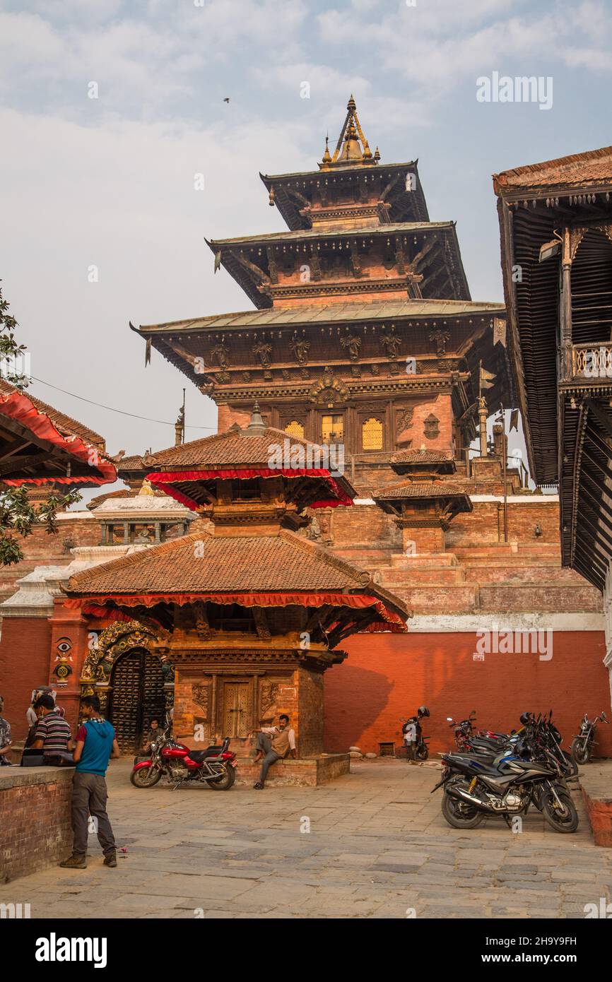 The Taleju Temple rises behind a smaller shrine in Durbar Square ...